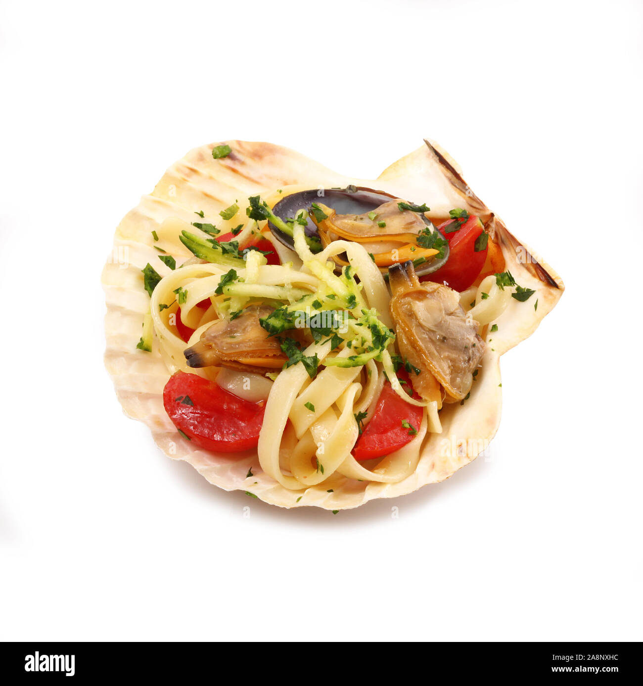 original italian pasta with clams in a shell Stock Photo - Alamy