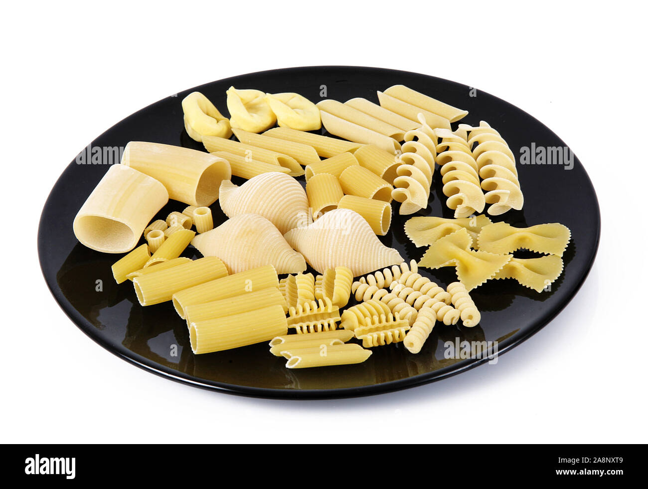 original italian pasta on white background Stock Photo - Alamy