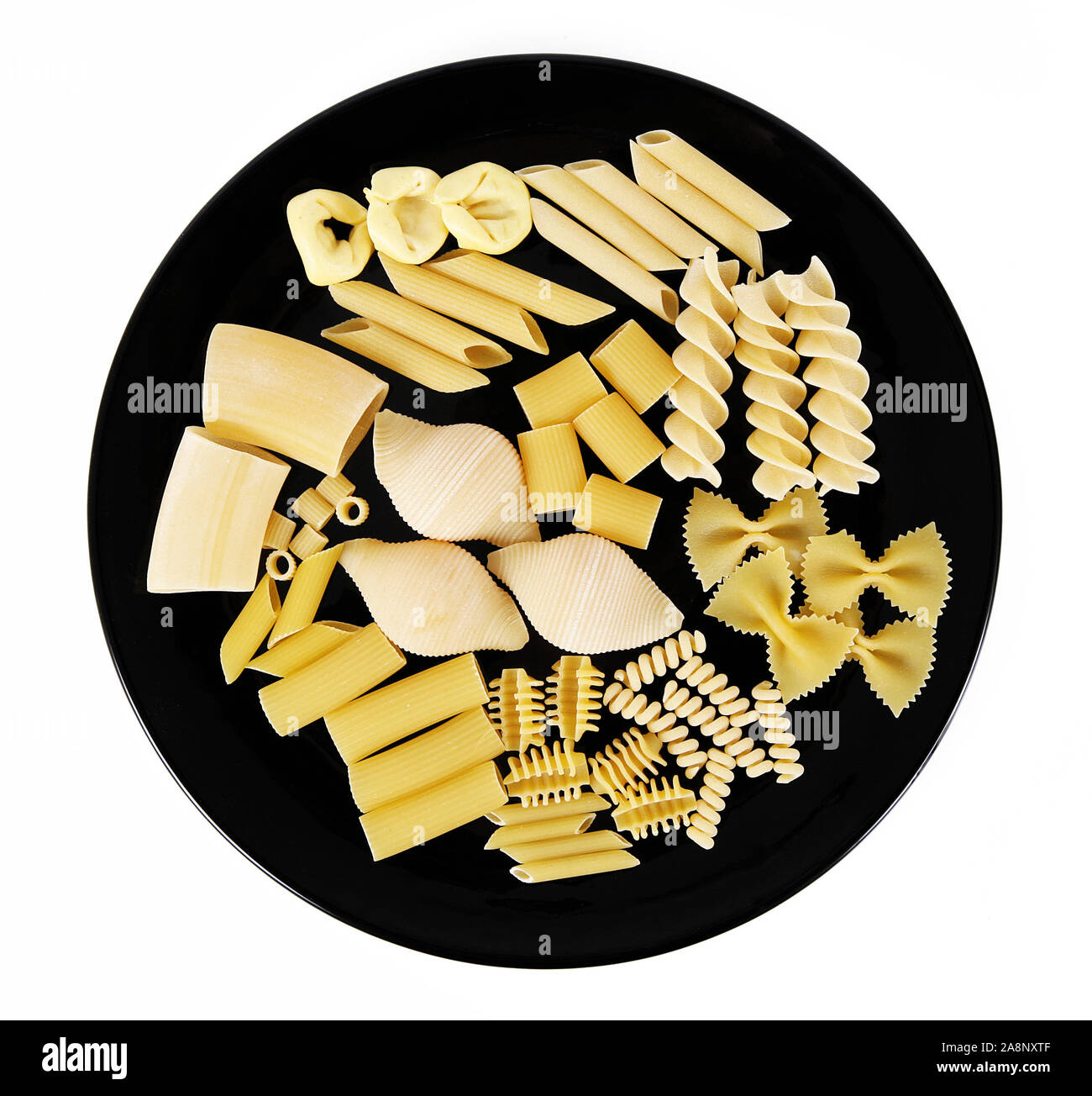 original italian pasta on white background Stock Photo - Alamy