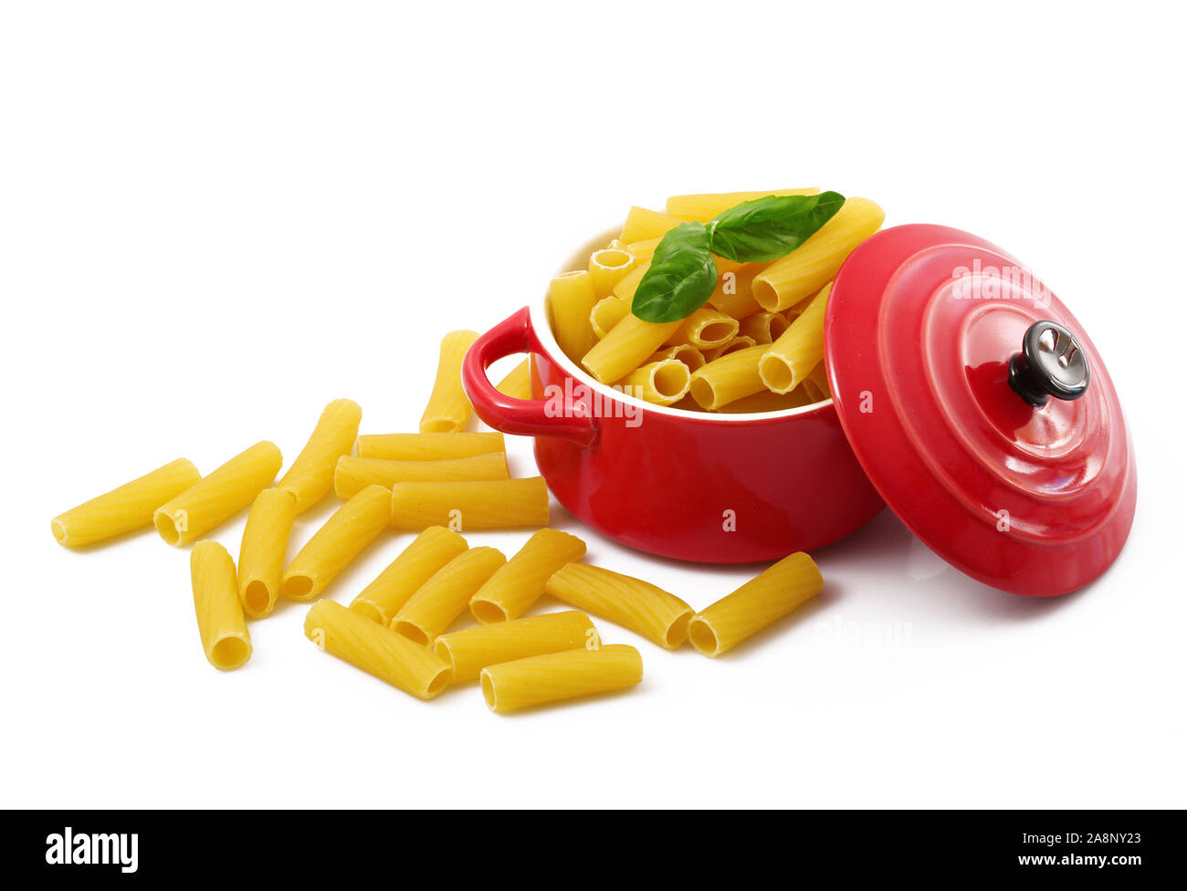 italian raw pasta in red pot Stock Photo - Alamy