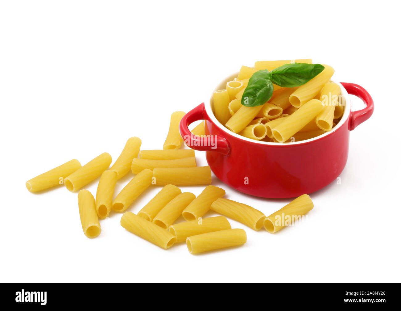 italian raw pasta in red pot Stock Photo - Alamy