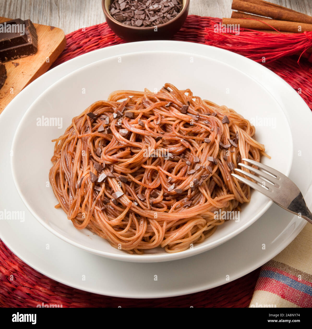 original italian spaghetti with chocolate and pepper Stock Photo - Alamy
