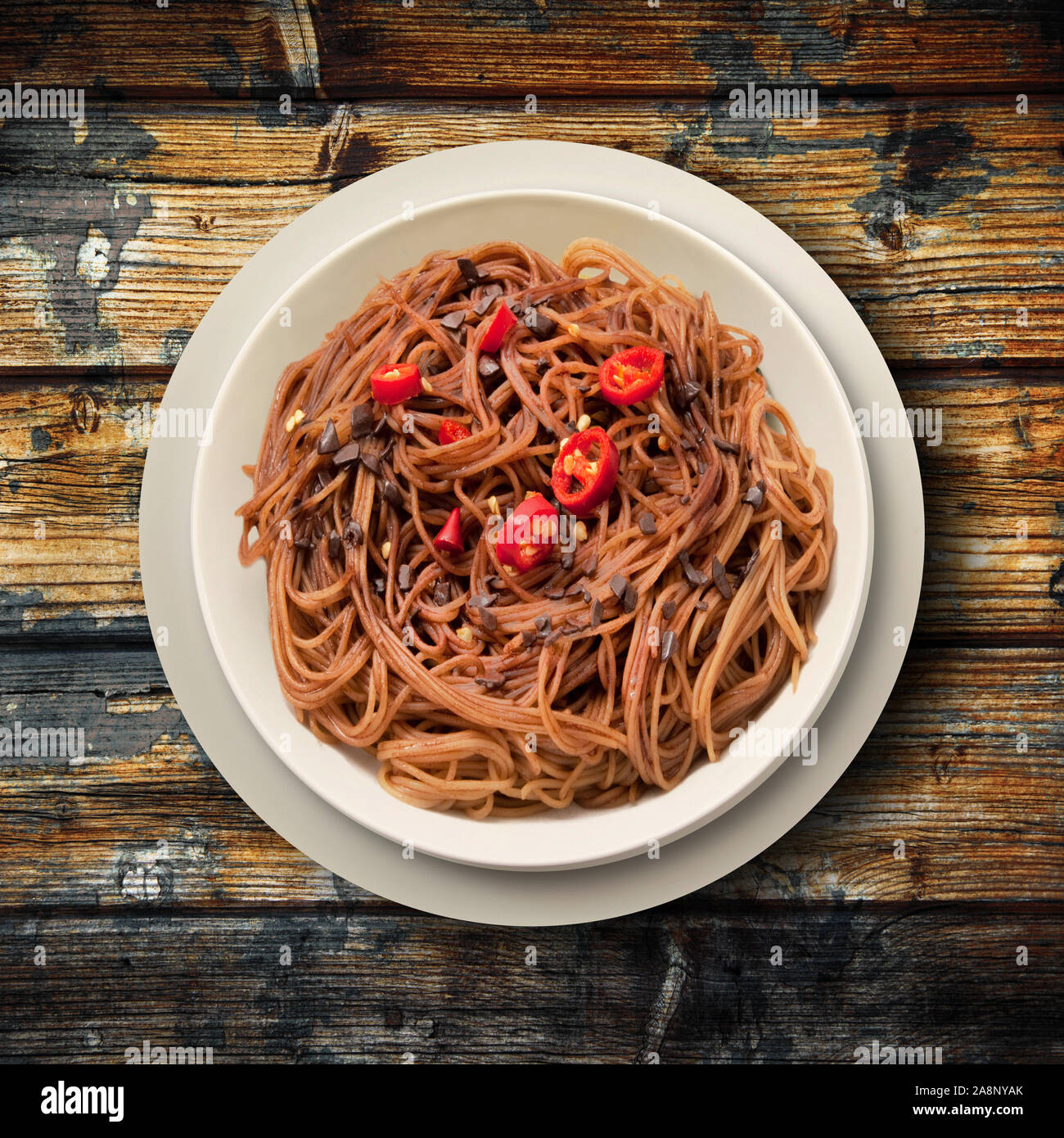 original italian spaghetti with chocolate and pepper Stock Photo - Alamy