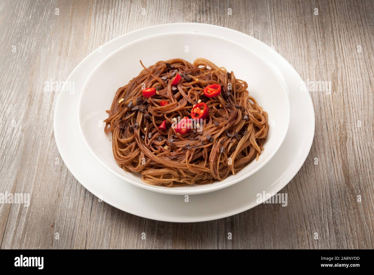original italian spaghetti with chocolate and pepper Stock Photo - Alamy