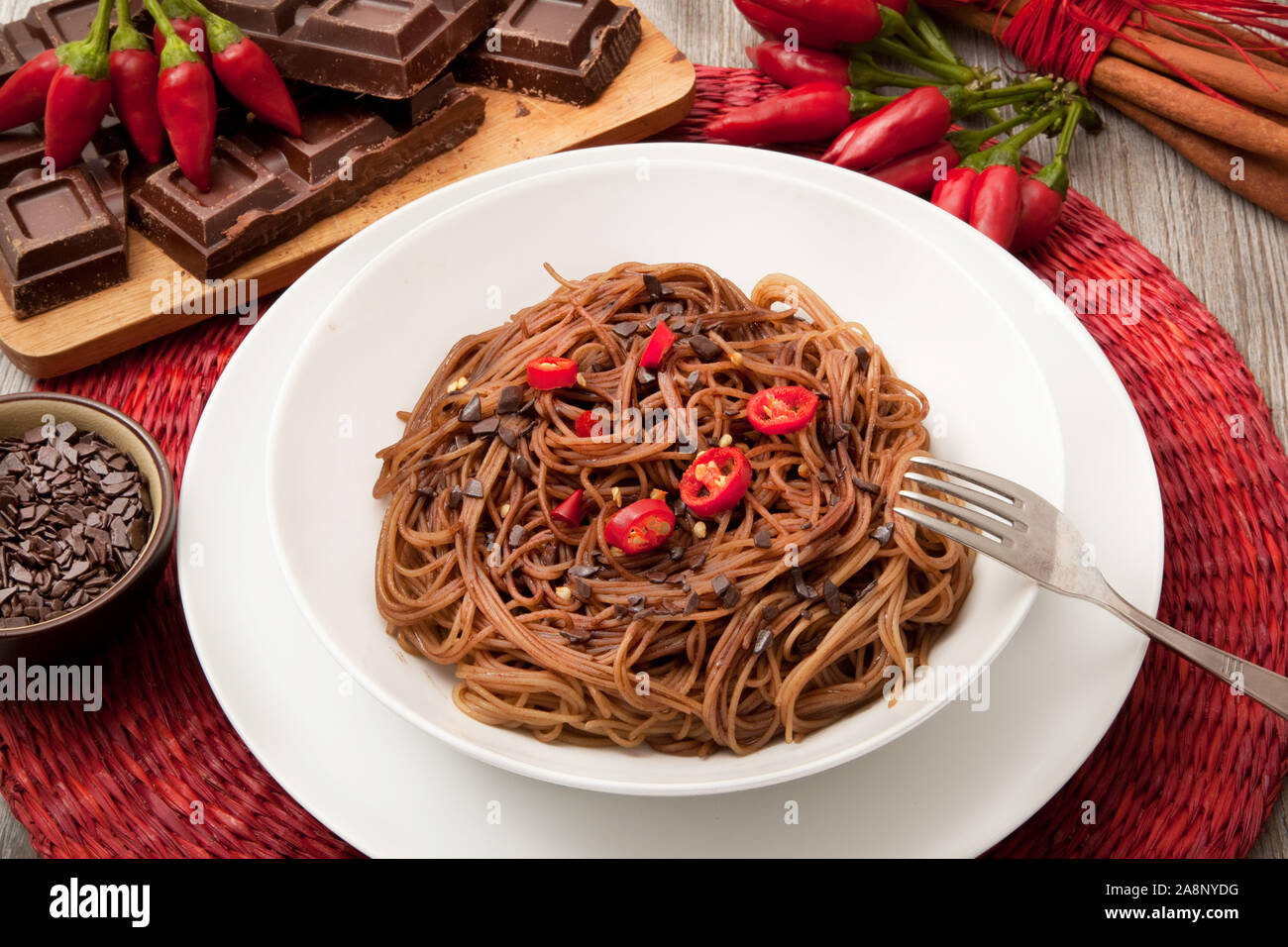 original italian spaghetti with chocolate and pepper Stock Photo - Alamy