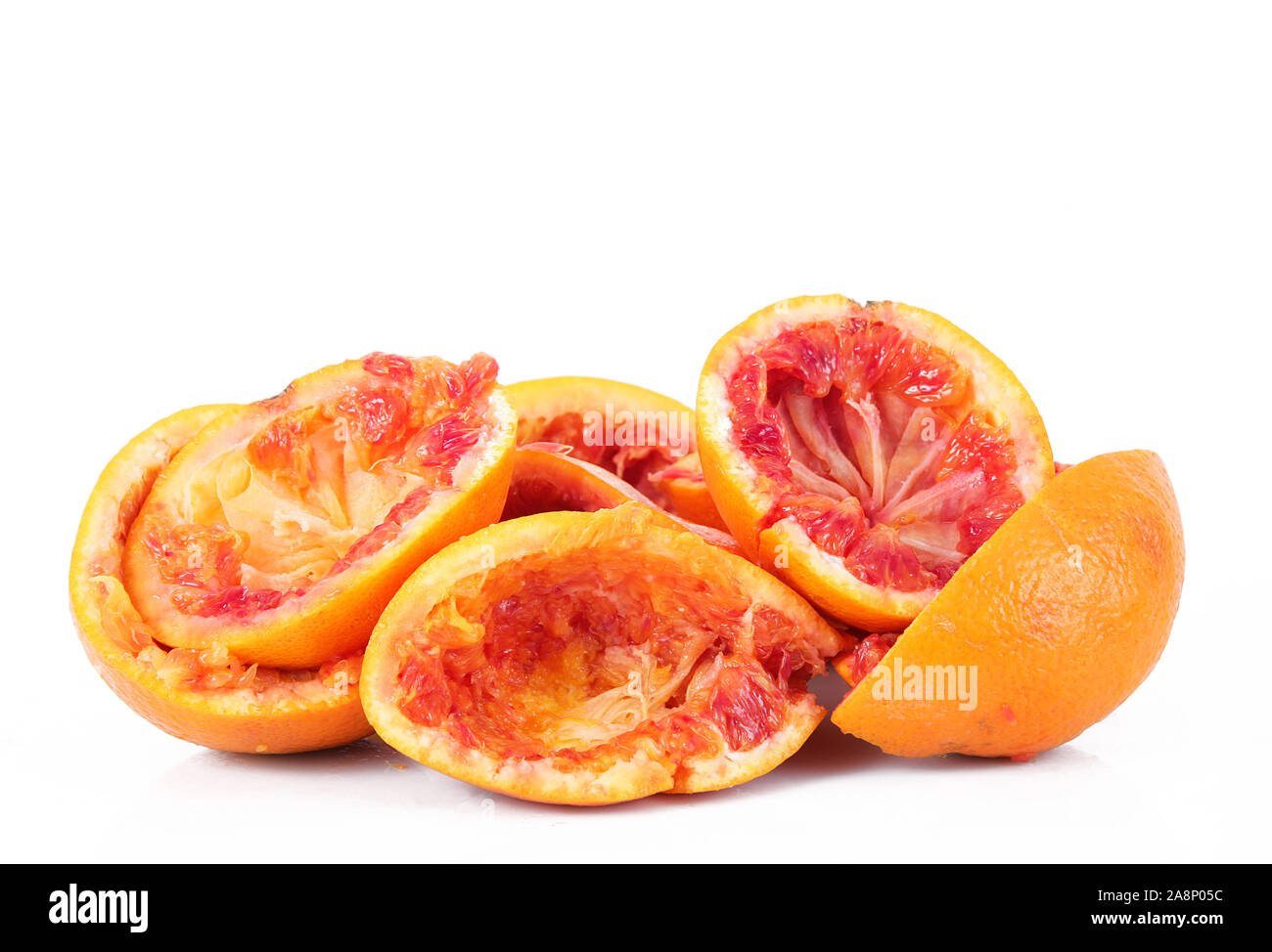 crushed orange on white background Stock Photo - Alamy