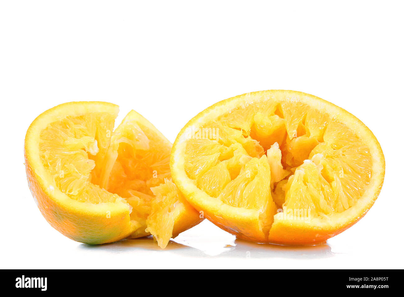 crushed orange on white background Stock Photo - Alamy