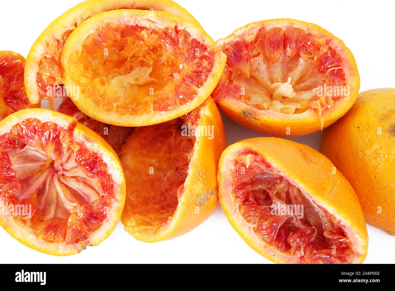 crushed orange on white background Stock Photo - Alamy
