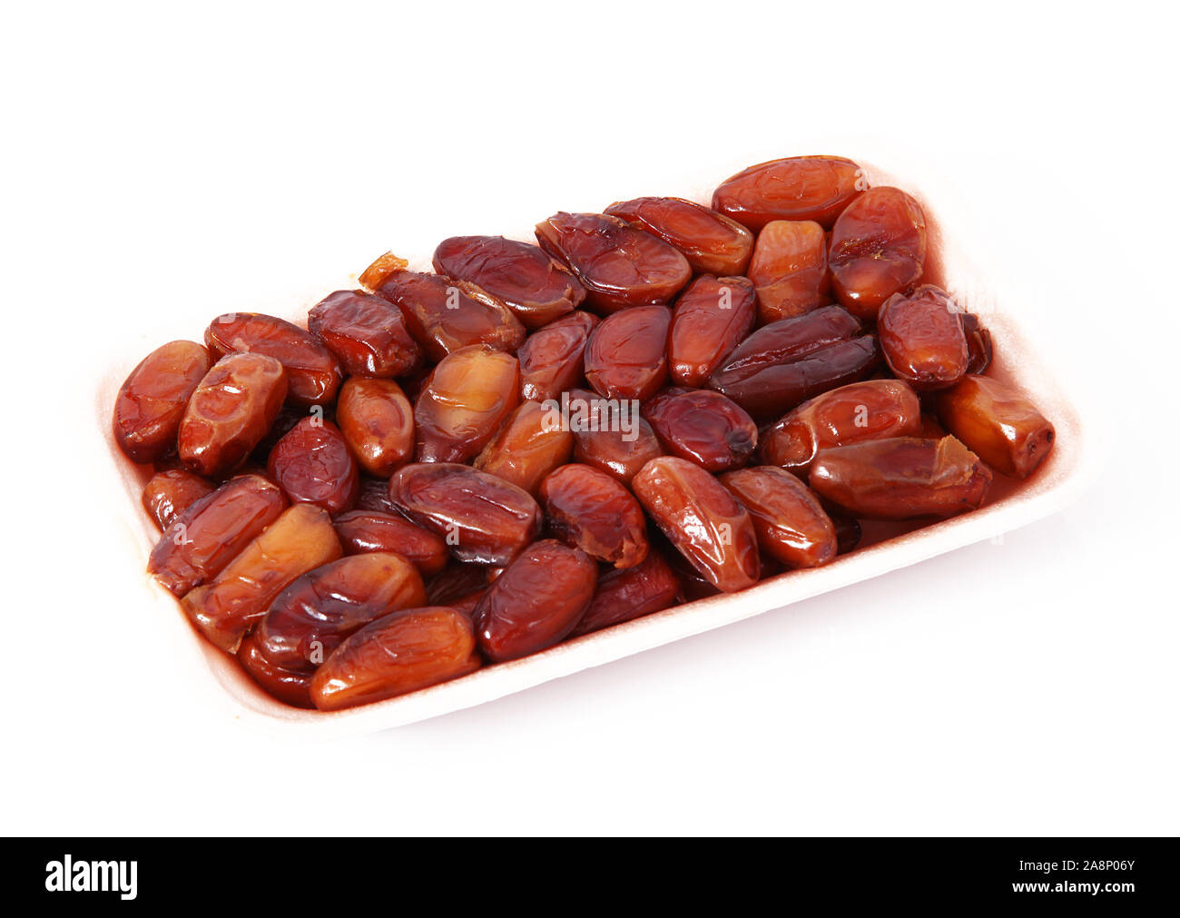 sweet dates on white background Stock Photo - Alamy