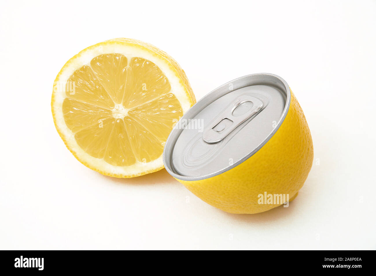 juice of lemon in tin on white background Stock Photo - Alamy