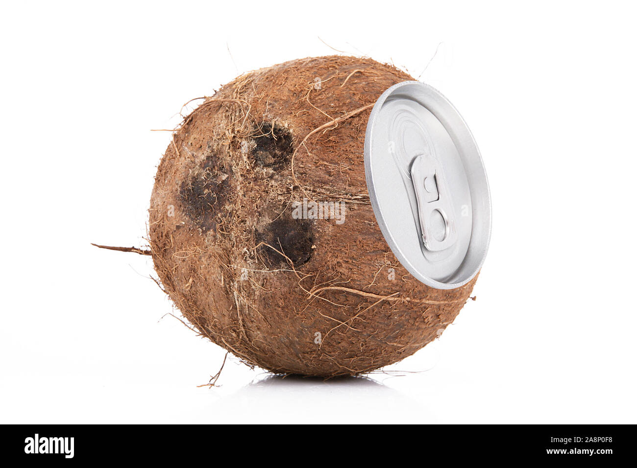 juice of coconut in tin on white background Stock Photo - Alamy