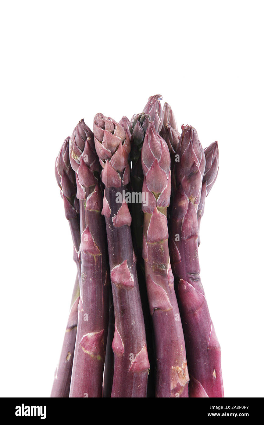 fresh red asparagus on white background Stock Photo - Alamy