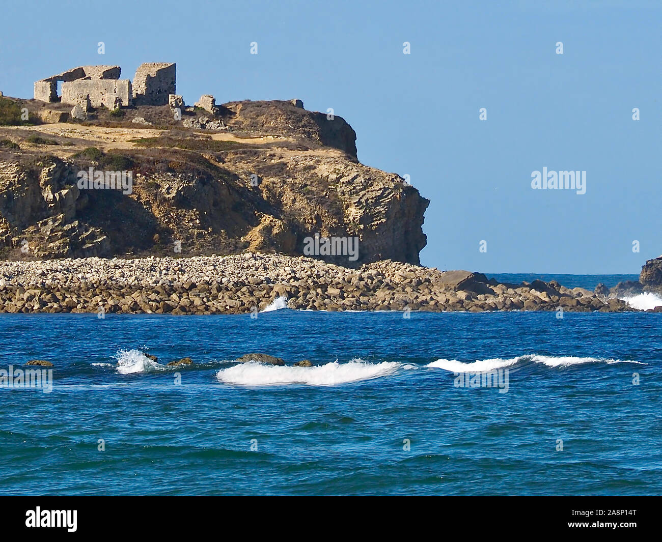Huge interesting cliffs in Peniche in Portugal with a face Stock Photo ...