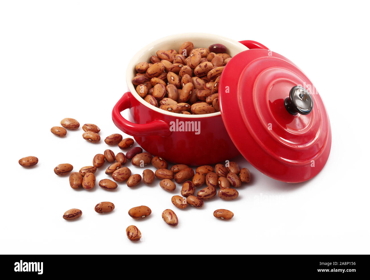 dry beans in pot on white background Stock Photo - Alamy