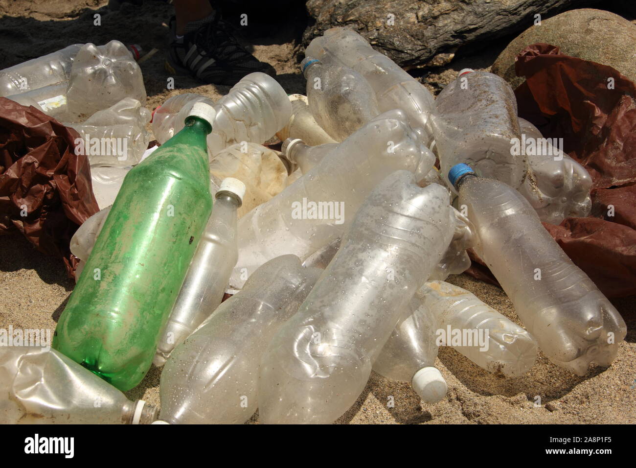 Big plastic pollution, plastic and waste from ocean on the beach ...