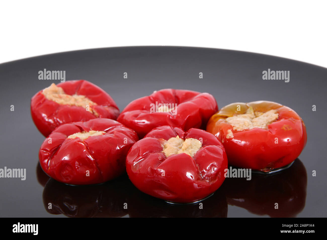 Red peppers stuffed with tuna Stock Photo - Alamy