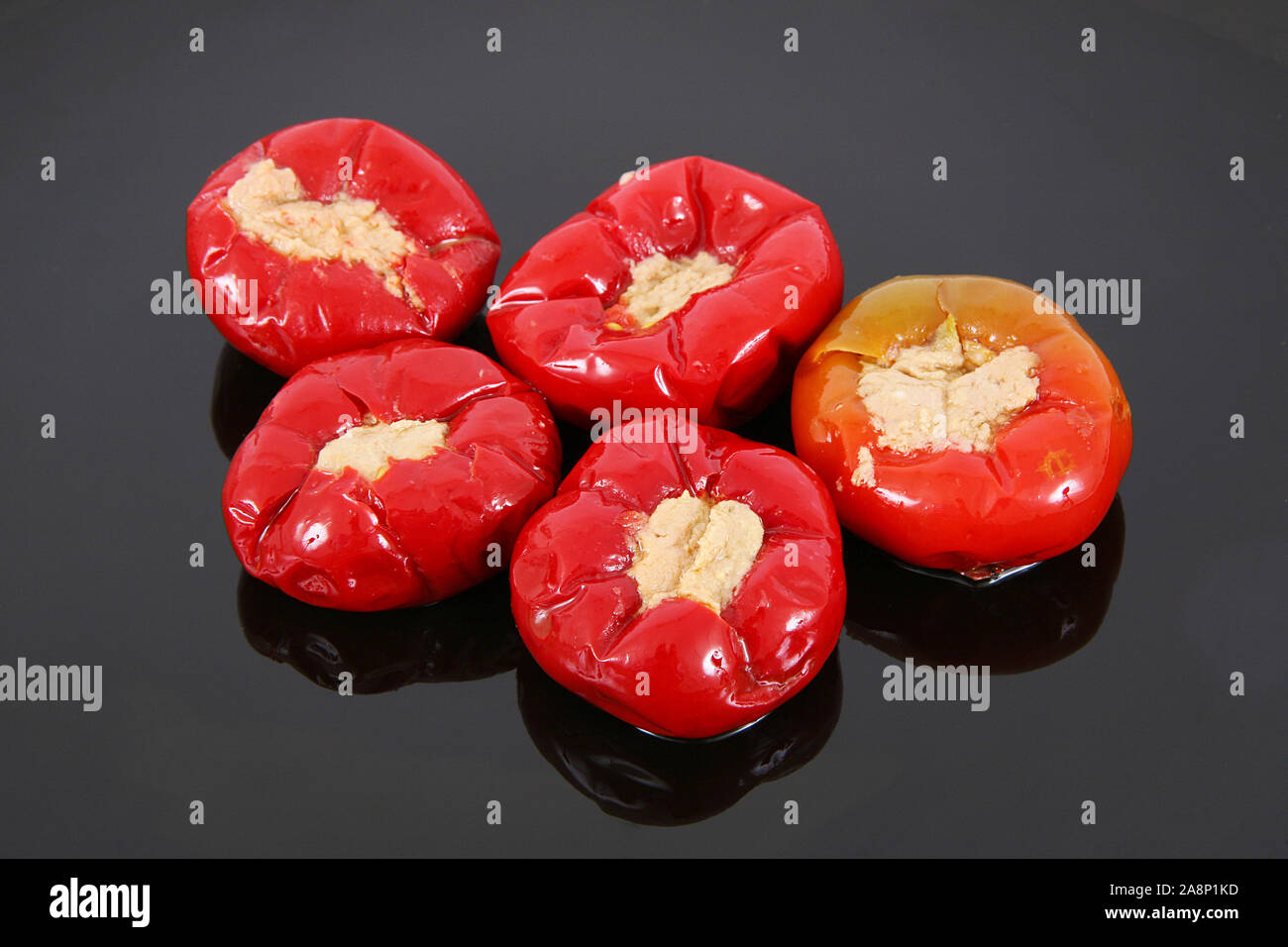 Red peppers stuffed with tuna Stock Photo - Alamy