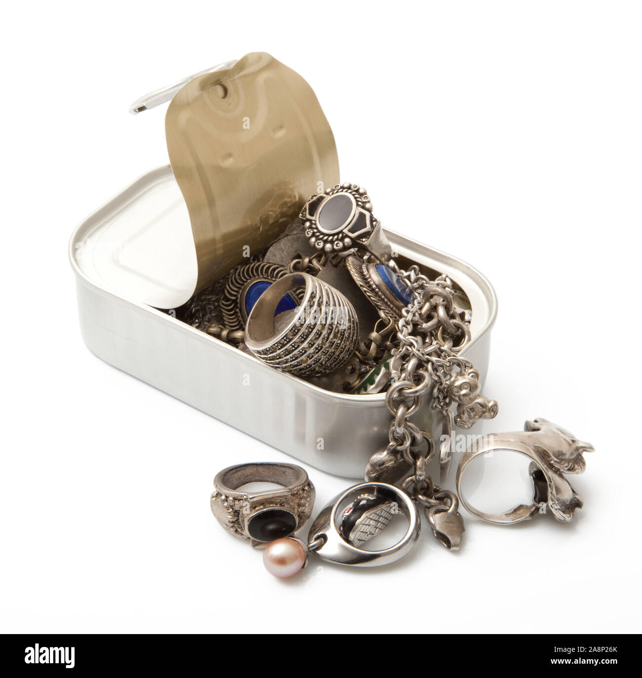 silver objects in tin on white background Stock Photo - Alamy