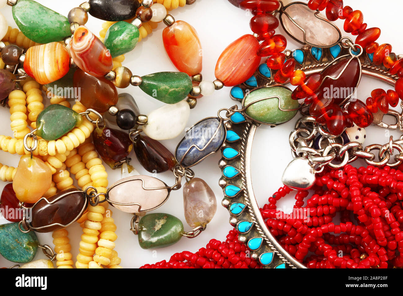 Variety of jewels on white background Stock Photo - Alamy