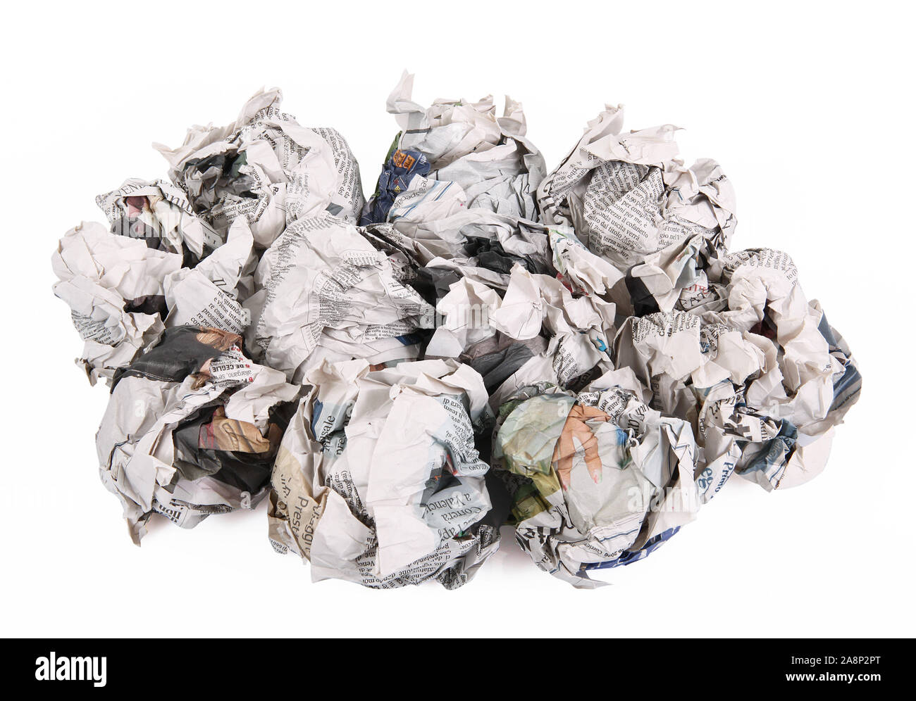Newspapers balls on white background Stock Photo - Alamy