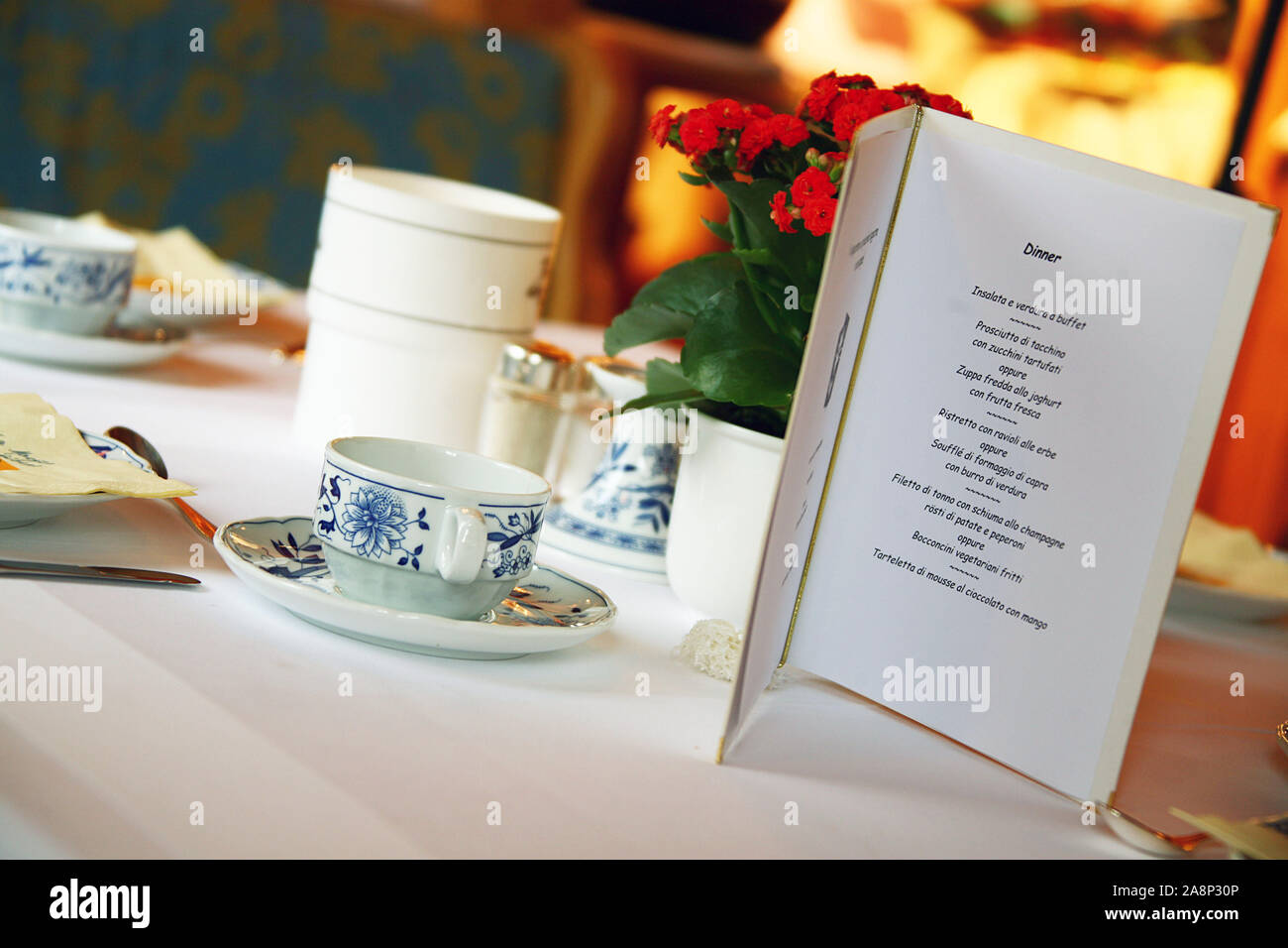 a menu resting on the table at the restaurant Stock Photo - Alamy