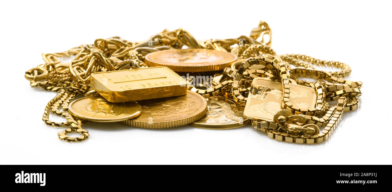 precious gold objects on white background Stock Photo - Alamy