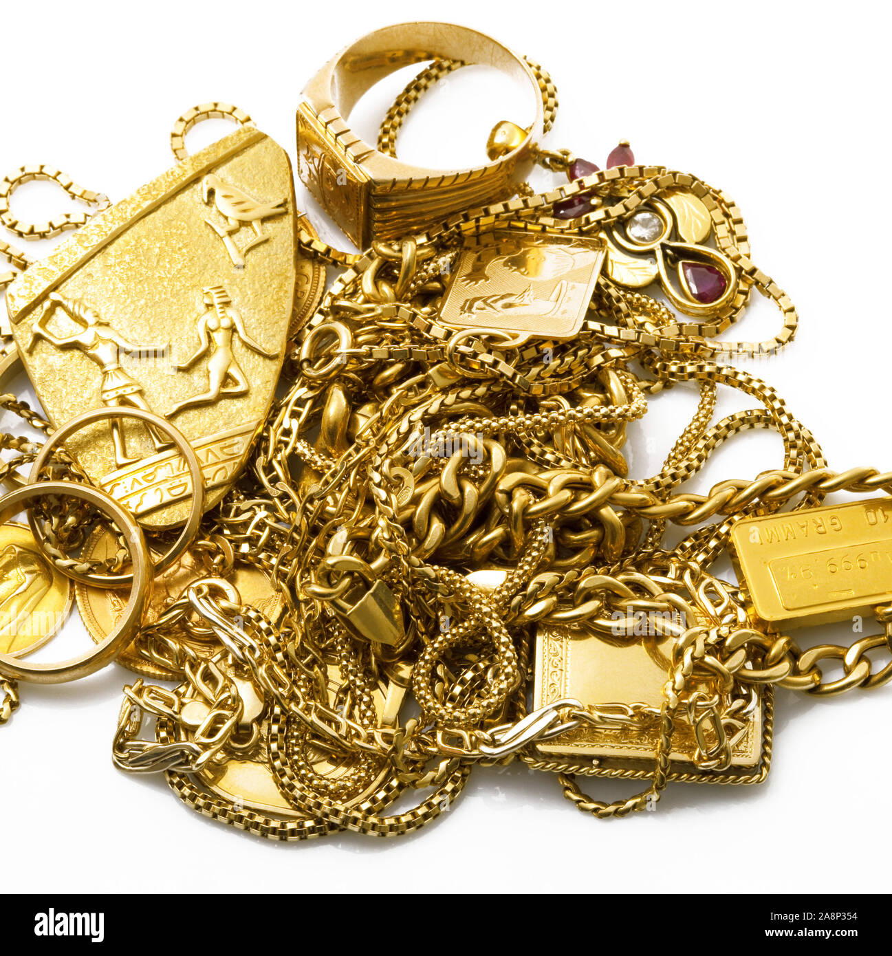 precious gold objects on white background Stock Photo - Alamy