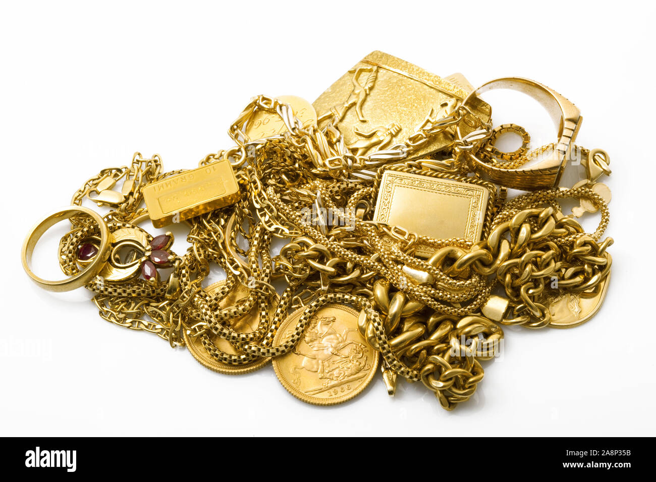 precious gold objects on white background Stock Photo - Alamy