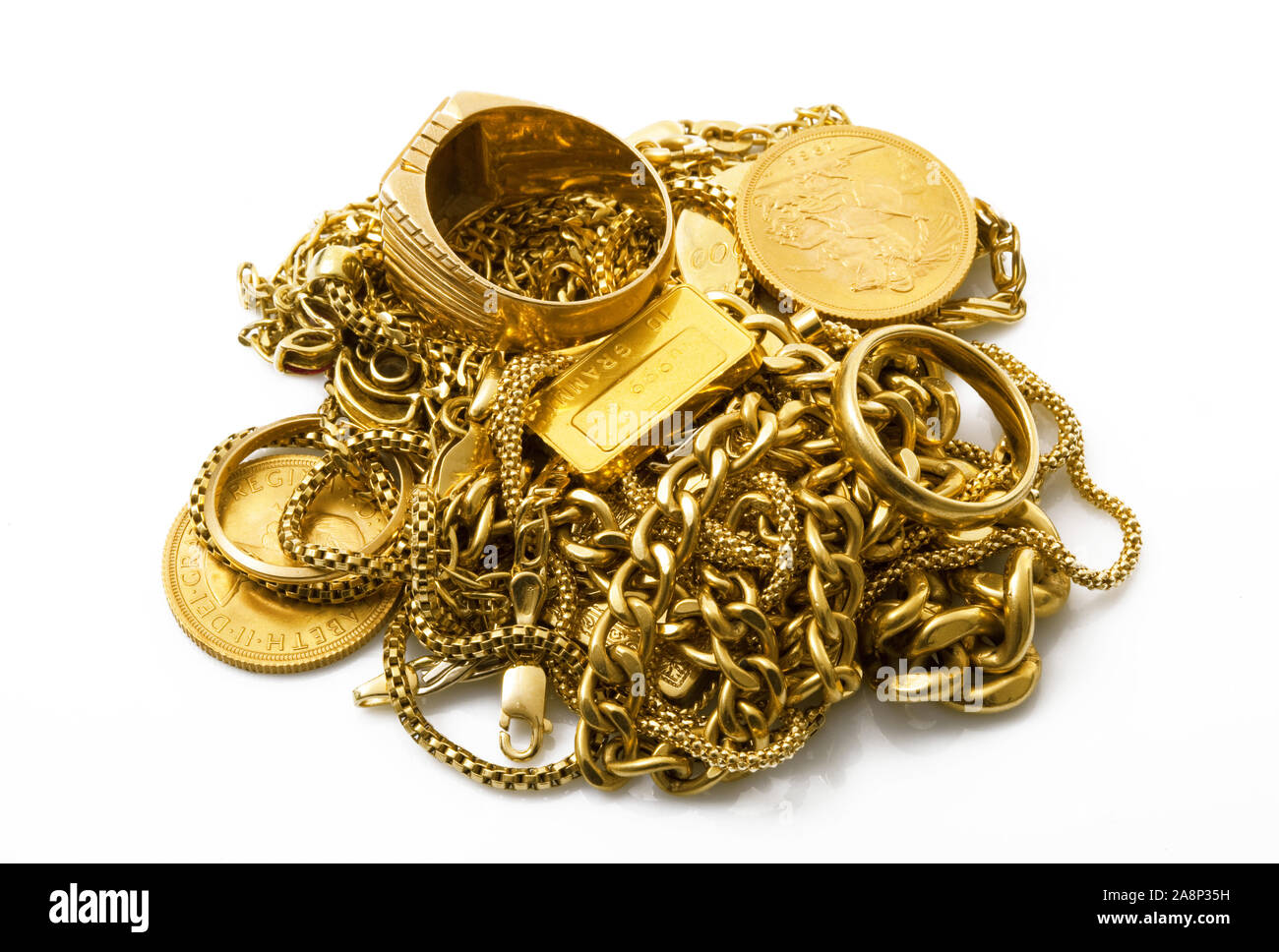precious gold objects on white background Stock Photo - Alamy