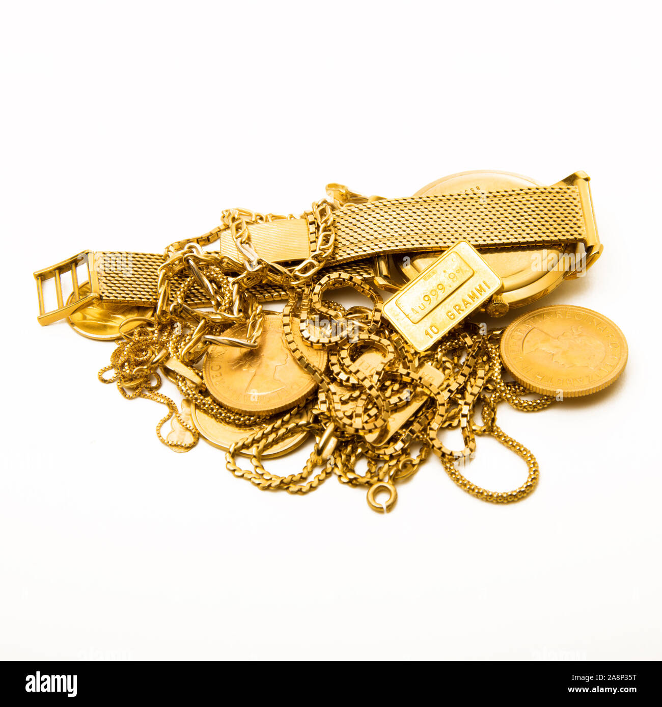 precious gold objects on white background Stock Photo - Alamy