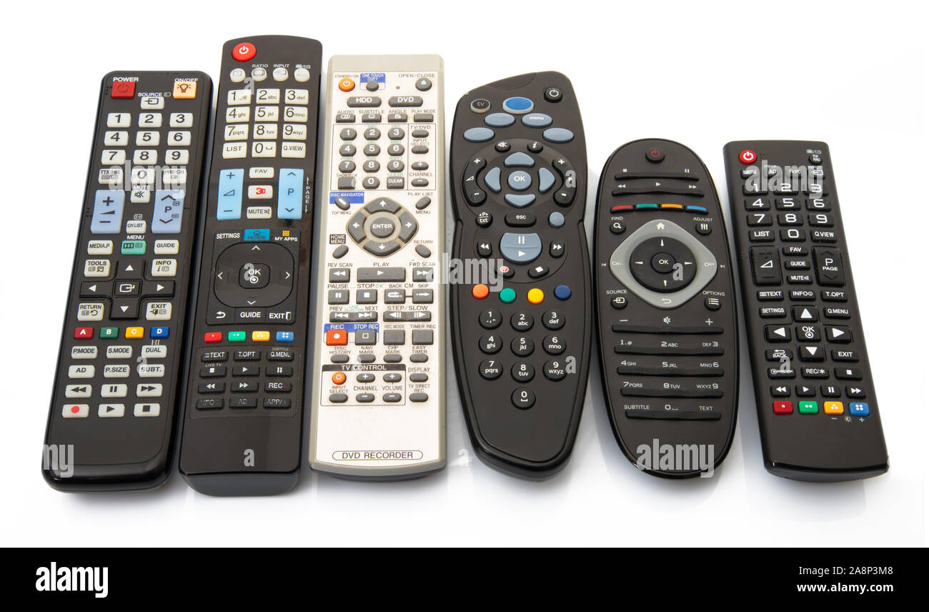 isolated remote control group on white background Stock Photo - Alamy