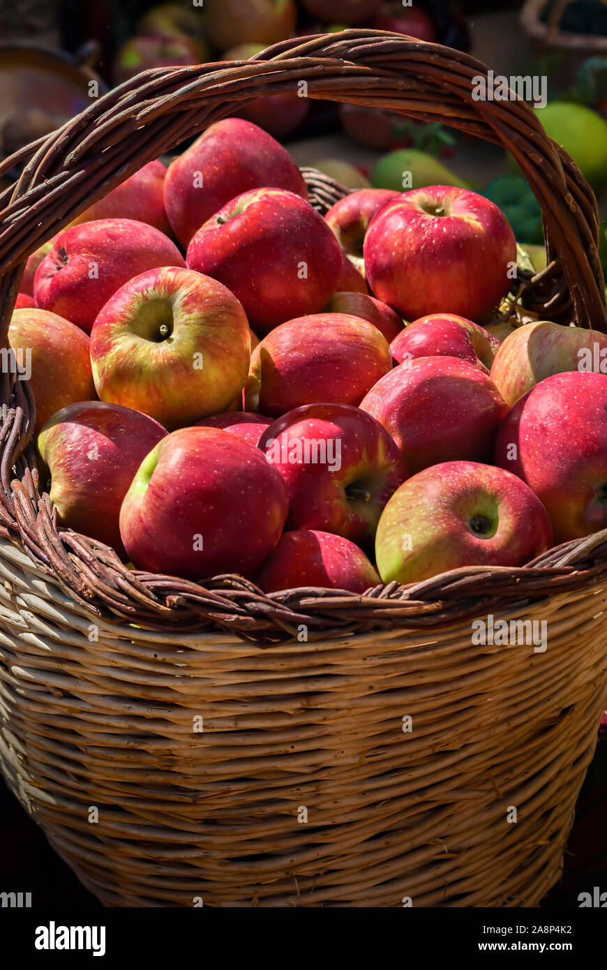 Apples in a basket Stock Photo - Alamy