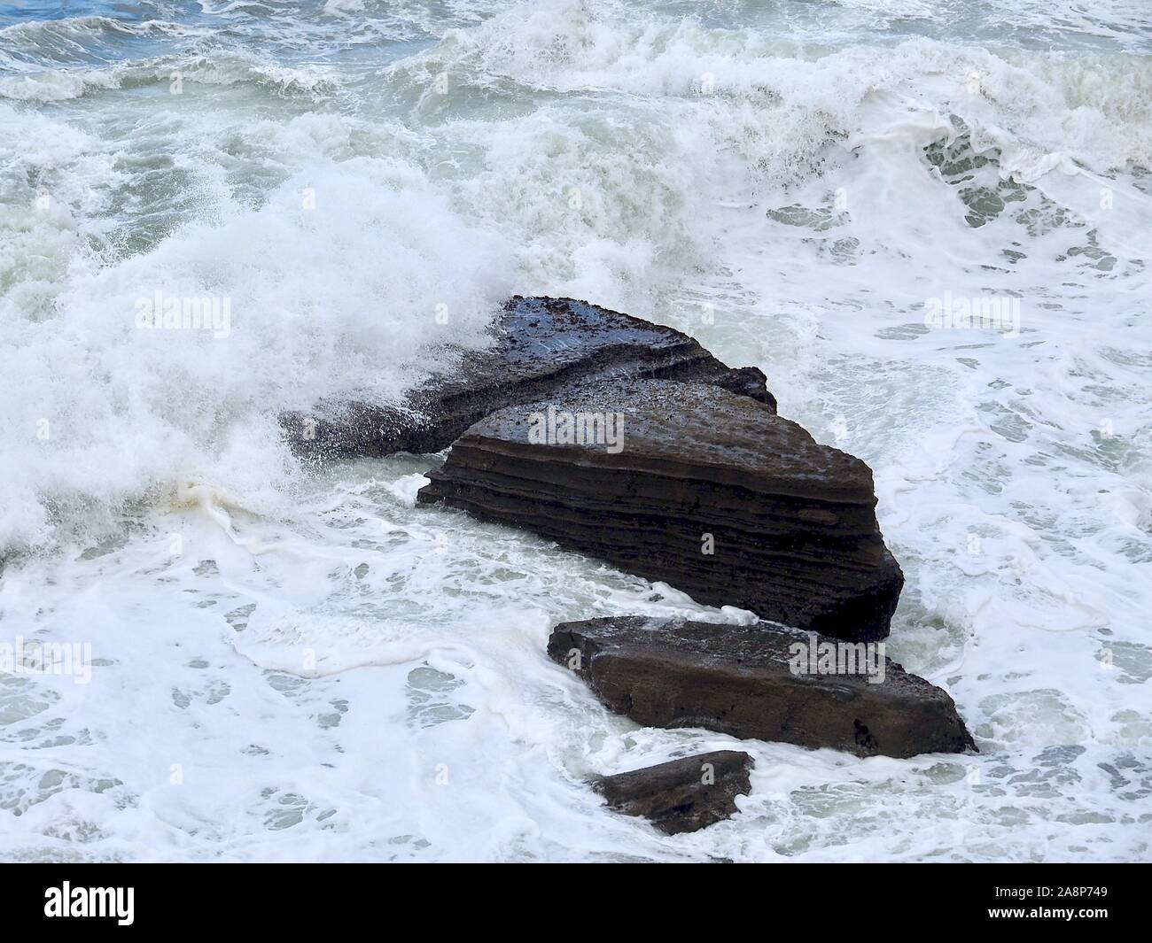 Huge interesting cliffs in Peniche in Portugal with a face Stock Photo ...