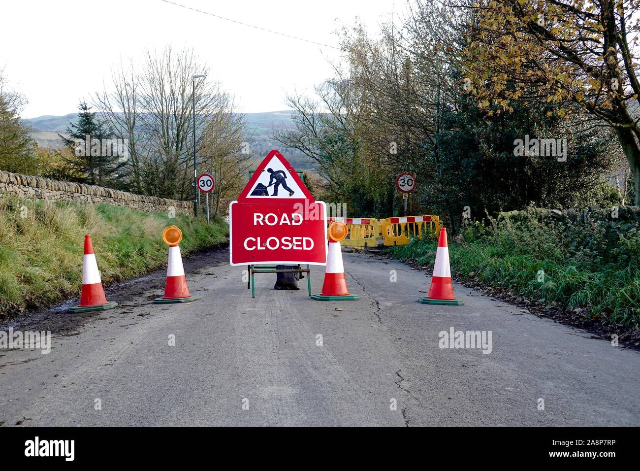 Temporary road sign denoting road closure Stock Photo - Alamy