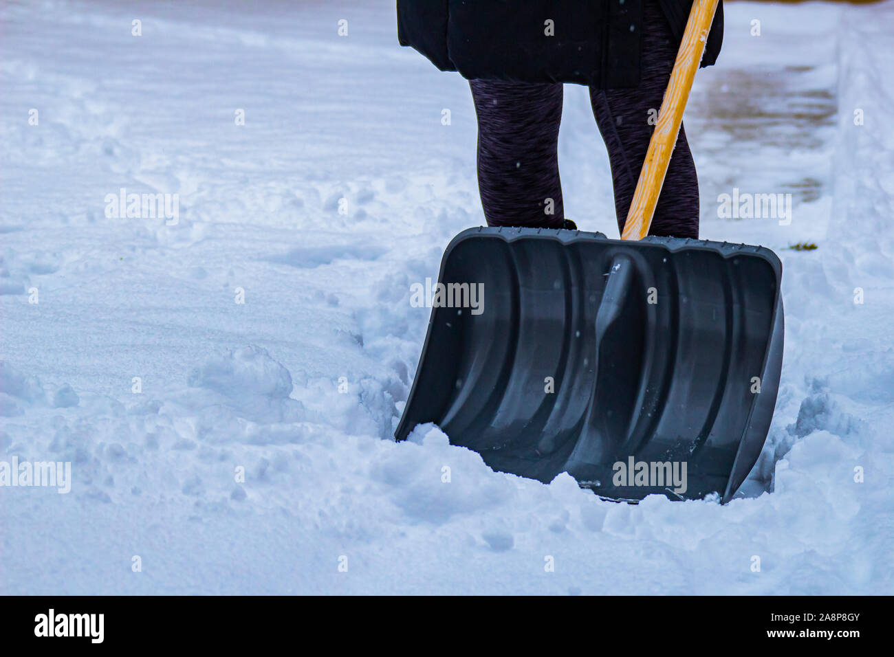 Blue snow shovel hi-res stock photography and images - Alamy