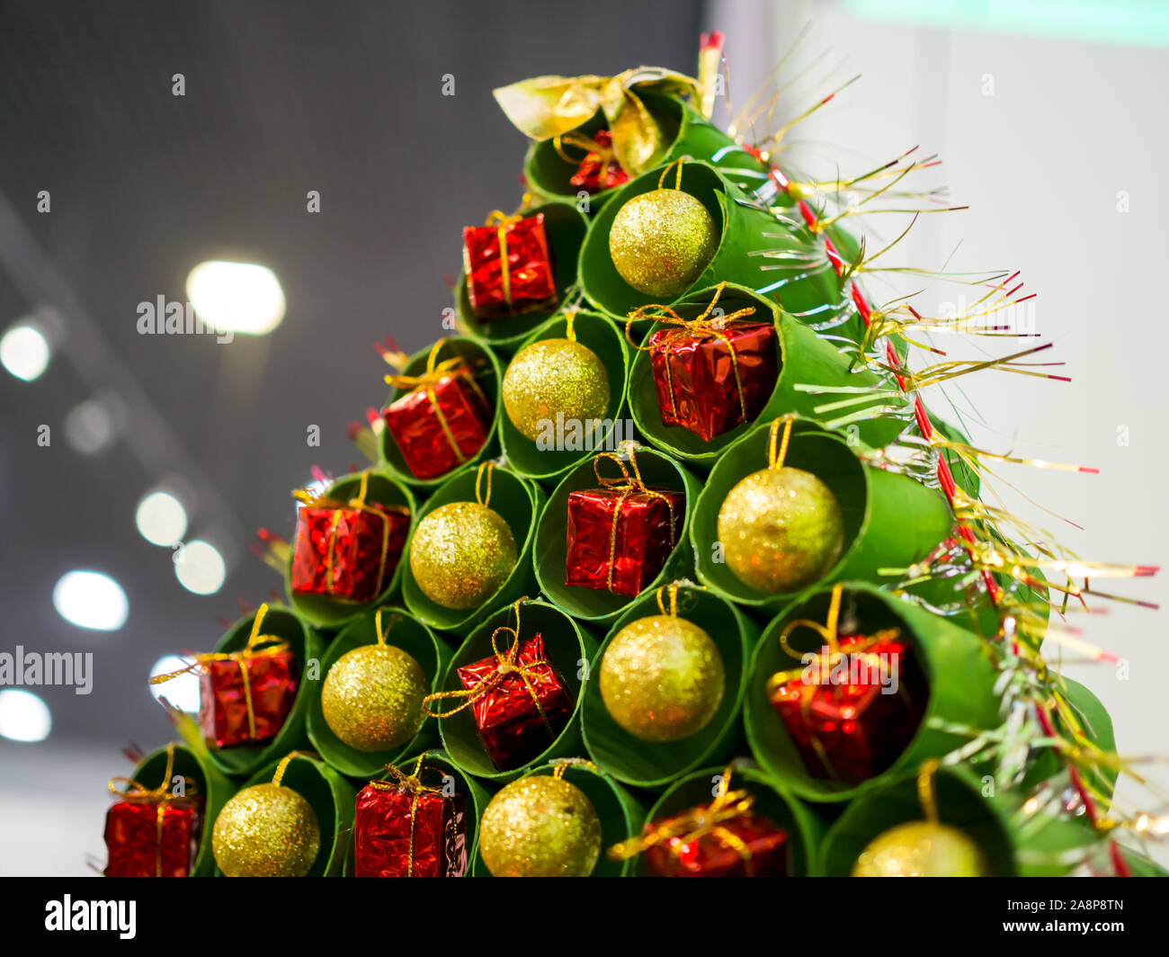 Homemade Christmas tree made of paper tubes Stock Photo - Alamy