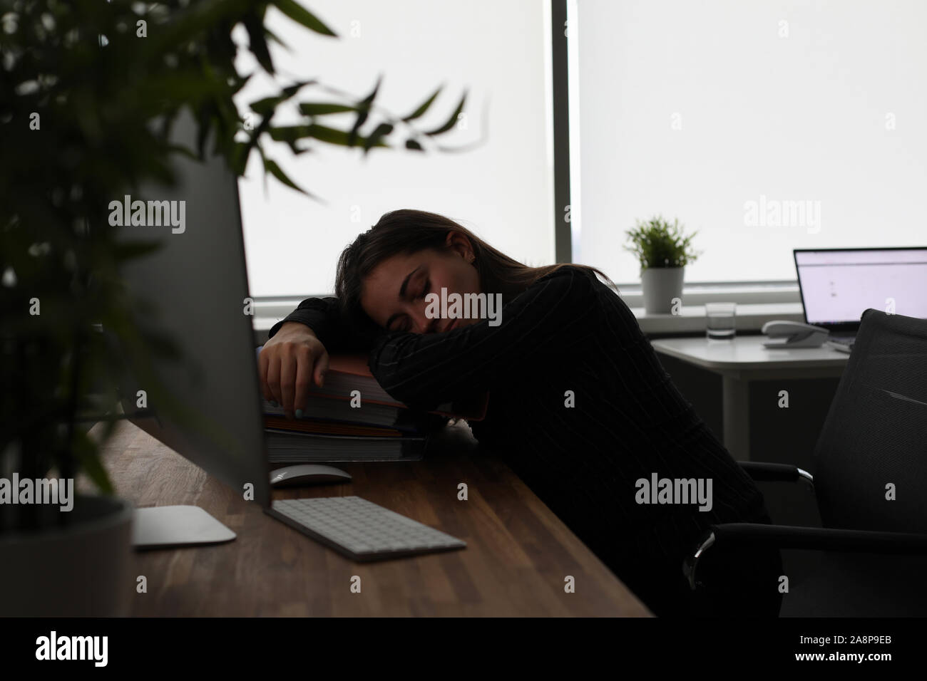 Woman wants to go home and lives at work Stock Photo - Alamy