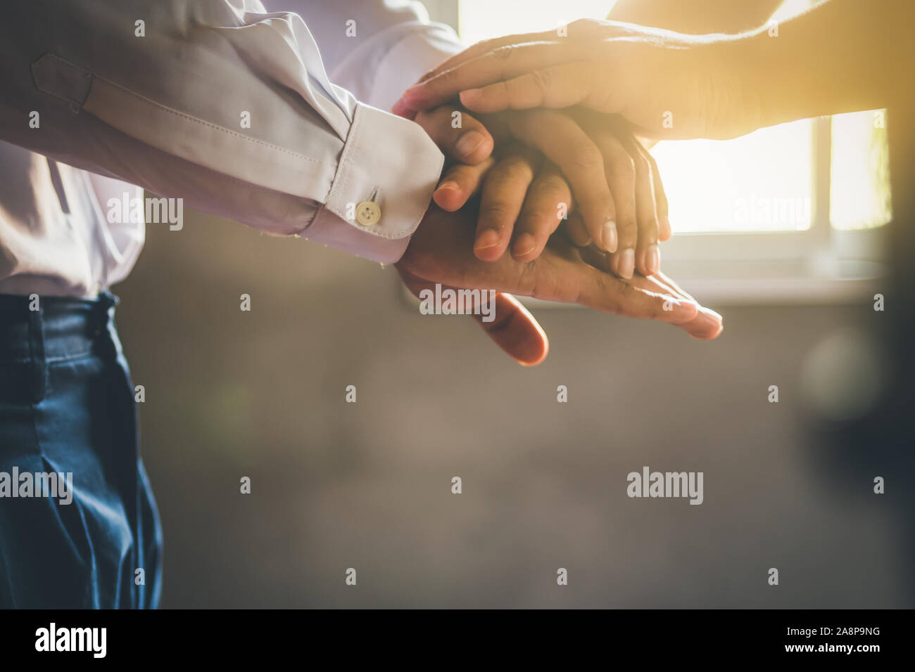 stack of human hands, two people put their hand together Stock Photo ...