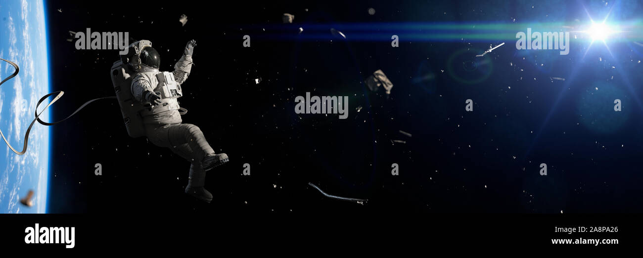 astronaut hit by space debris storm in orbit of planet Earth Stock ...