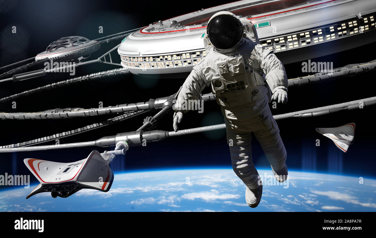 astronaut during spacewalk in front of a space station Stock Photo - Alamy