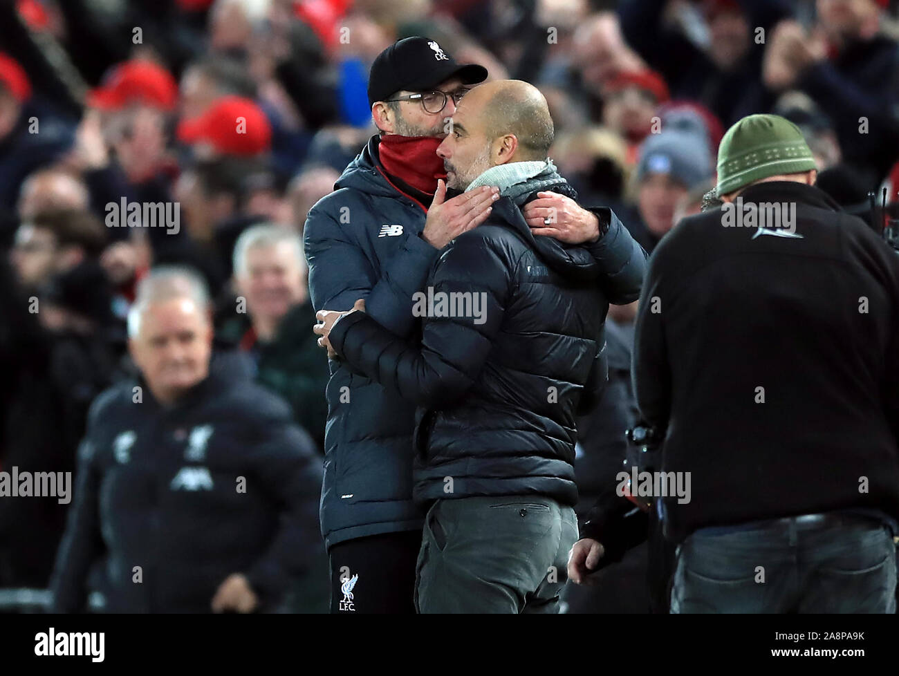 Liverpool manager Jurgen Klopp (left) and Manchester City manager Pep ...