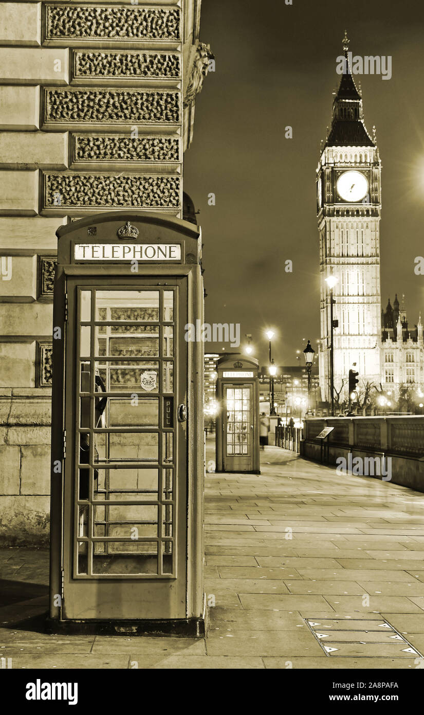 View of the Telephone Box and Houses of Parliament in London at night ...