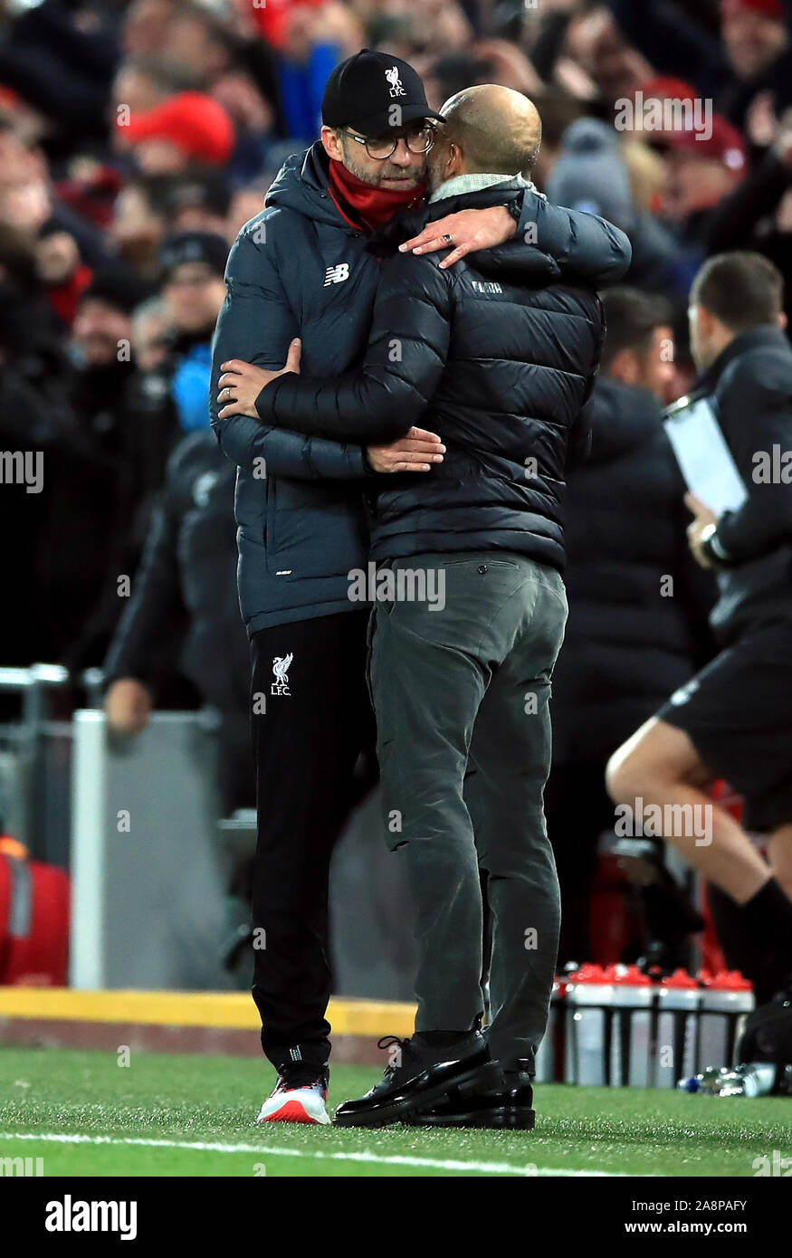 Liverpool manager Jurgen Klopp (left) and Manchester City manager Pep ...