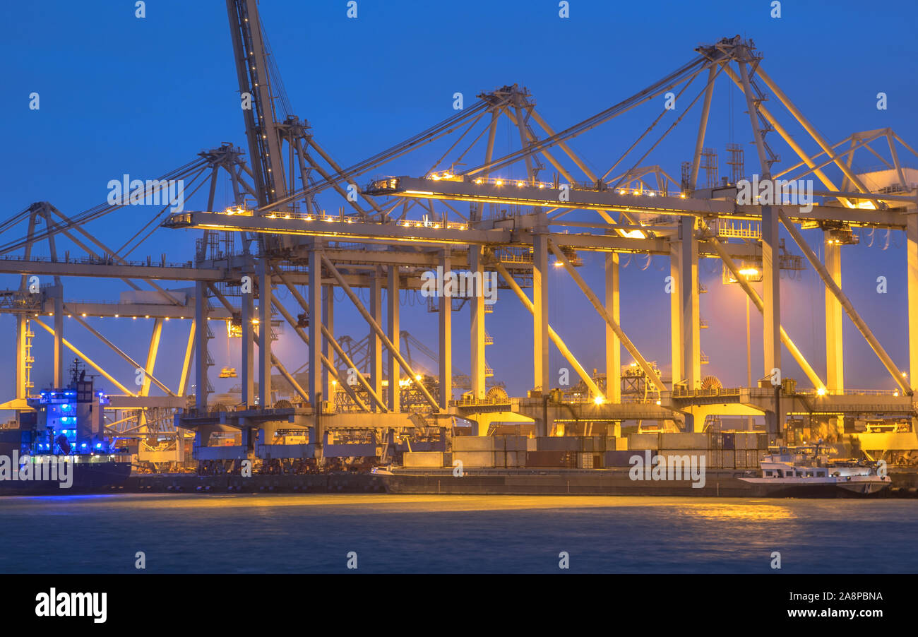 Container terminal at sunset in port of Rotterdam Europoort Maasvlakte ...