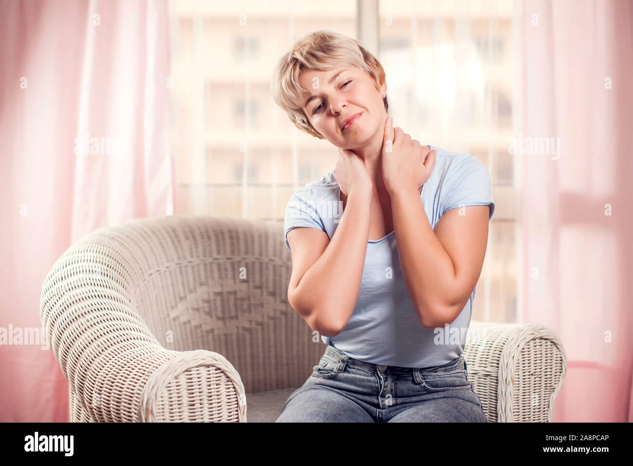 Woman feels strong neck pain. People, healthcare and medicine concept ...