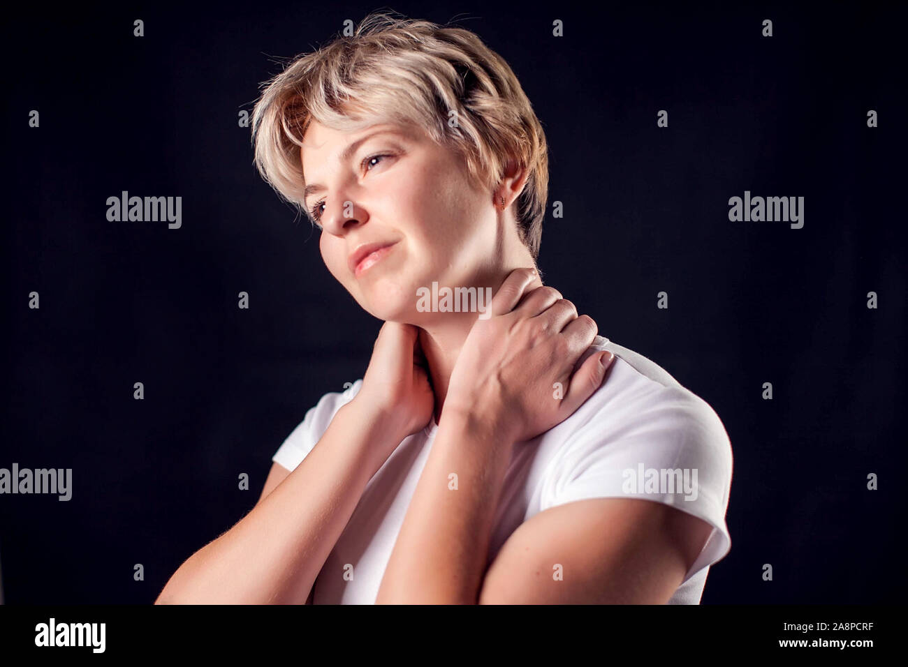 Woman feels strong neck pain. People, healthcare and medicine concept ...