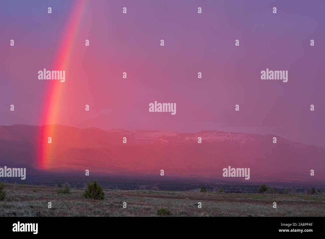 Steens Mountain rainbow, Oregon Stock Photo - Alamy