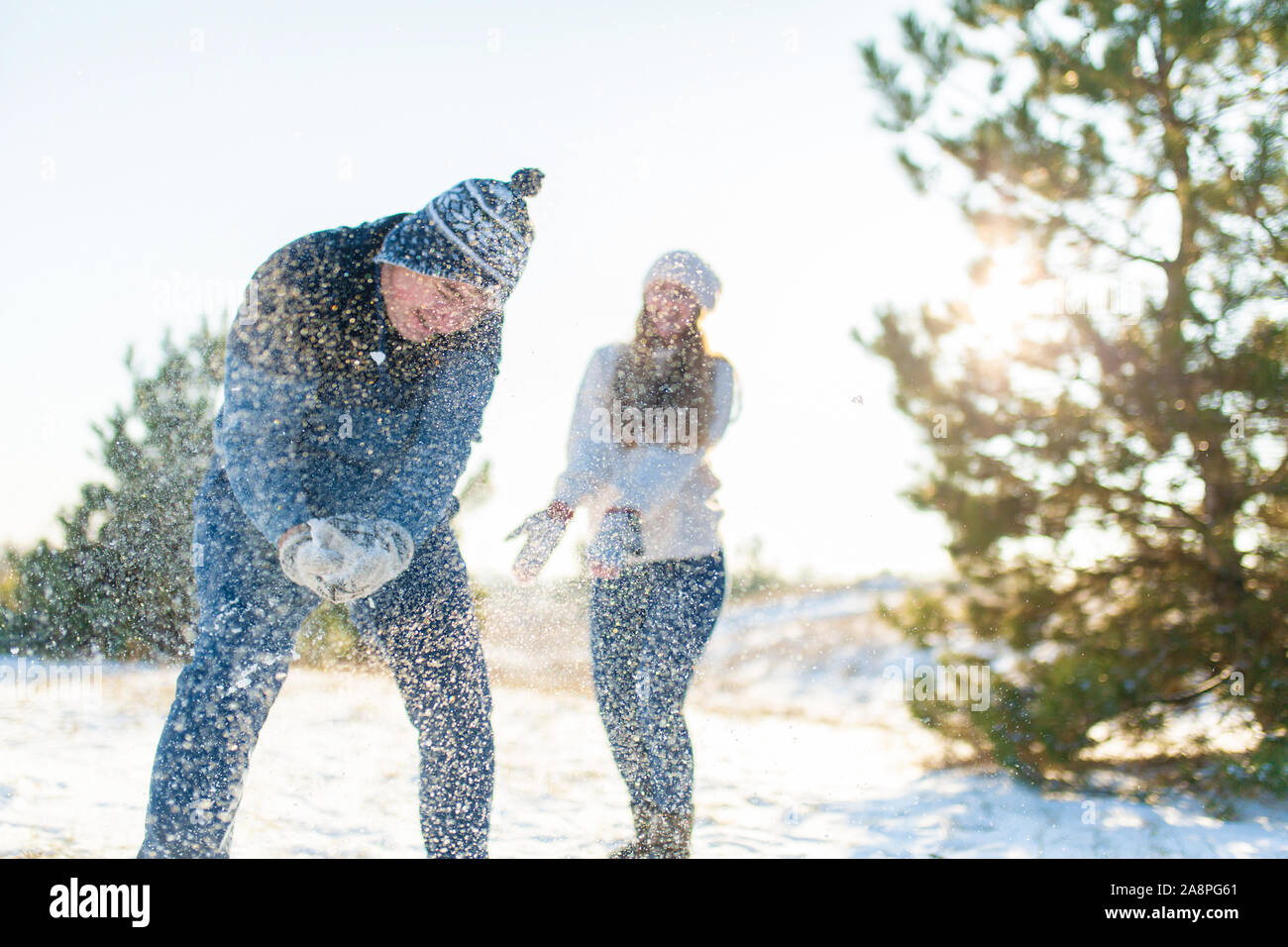 Throw snowballs at each other hi-res stock photography and images - Alamy