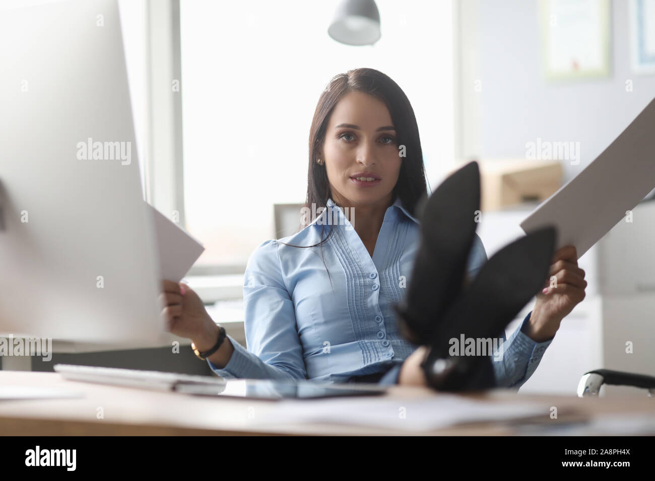 Busy woman at workplace Stock Photo - Alamy
