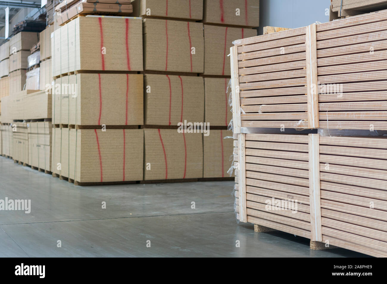 Warehouse tree. Pallets with wooden plates in a warehouse or in a ...